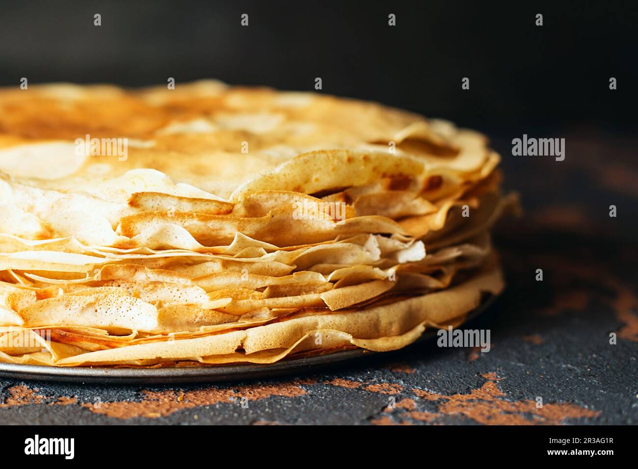 Russian pancakes in front of dark background. Pancake week - the ...