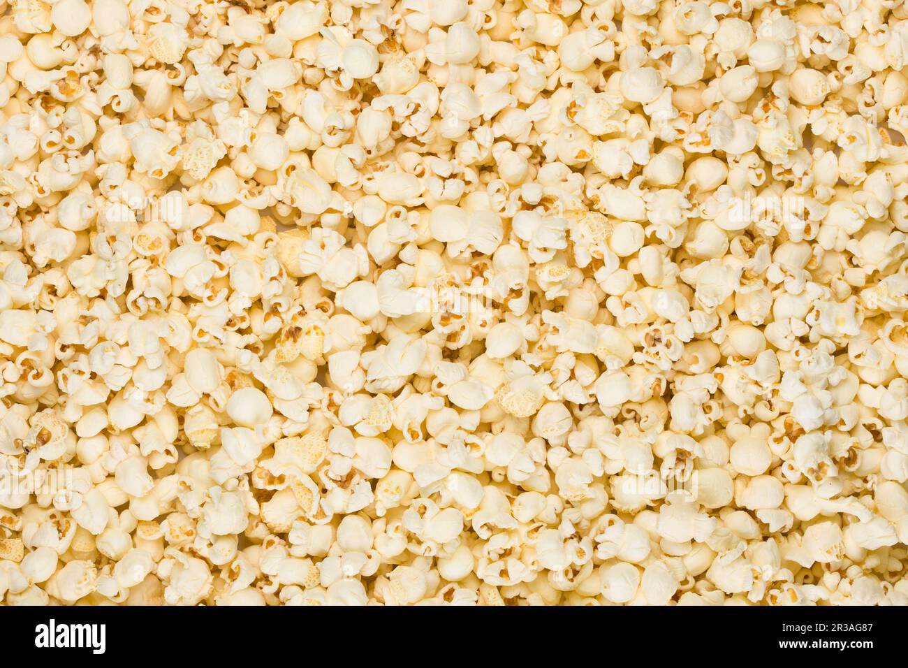 Scattered popcorn texture background Stock Photo - Alamy