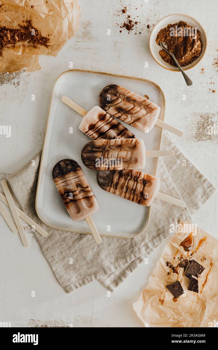 Homemade chocolate and caramel ice cream sticks Stock Photo - Alamy