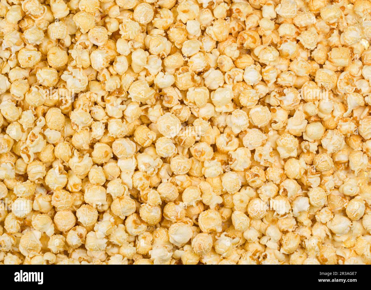 Scattered popcorn texture background Stock Photo - Alamy