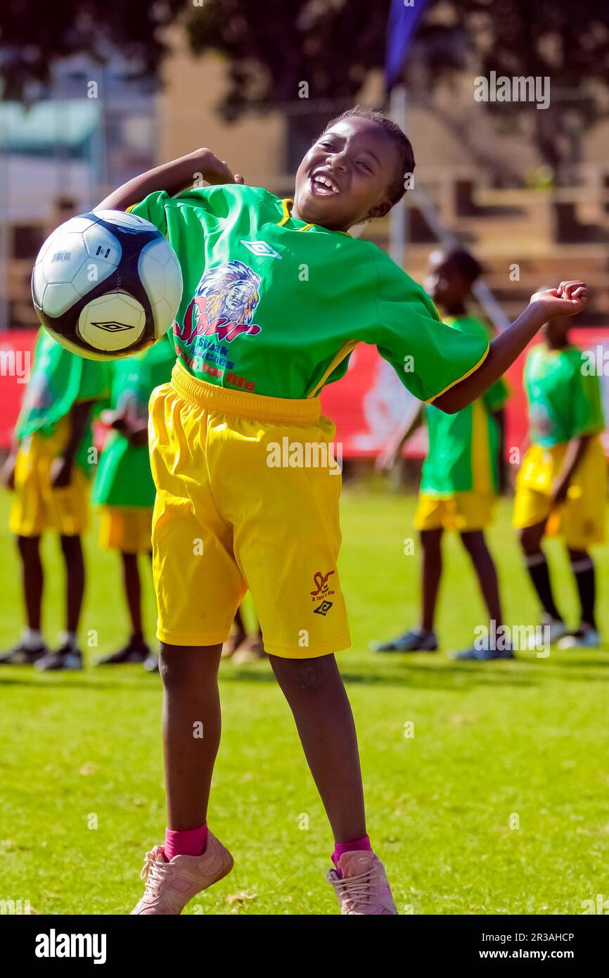 School children playing football school hi-res stock photography and ...