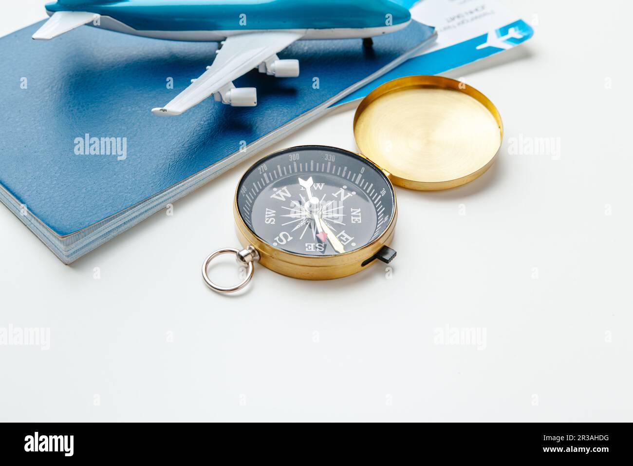 Time to Travel. Idea for tourism with flight tickets and compass on ...