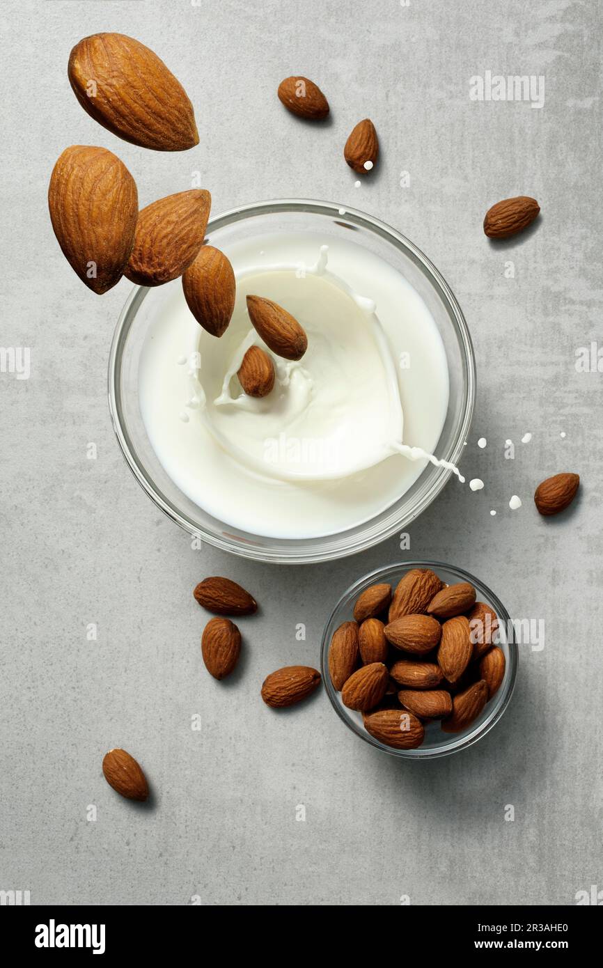 Drop milk falling slow motion hi-res stock photography and images - Alamy