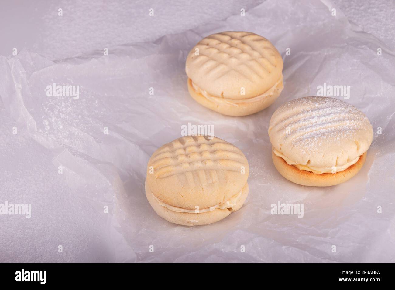 Sweet cream filled pastries powdered hi-res stock photography and ...