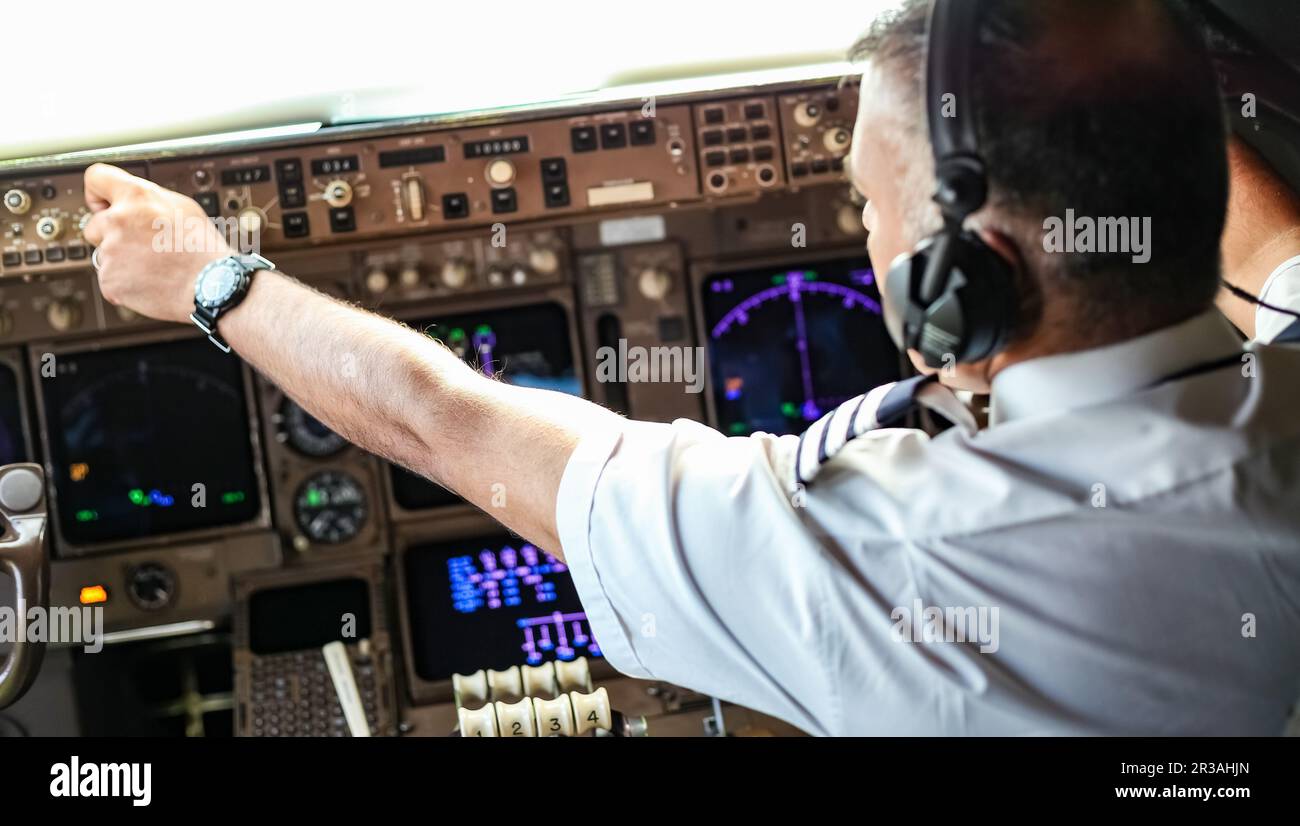 Over the Shoulder of a Indian Pilot in a Jumbo Cockpit Stock Photo - Alamy