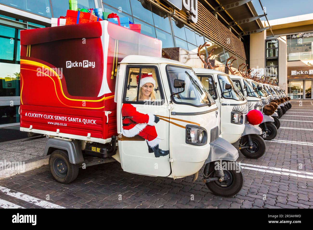 Small TukTuk Grocery Store Home Delivery Vehicles lined up at a ...