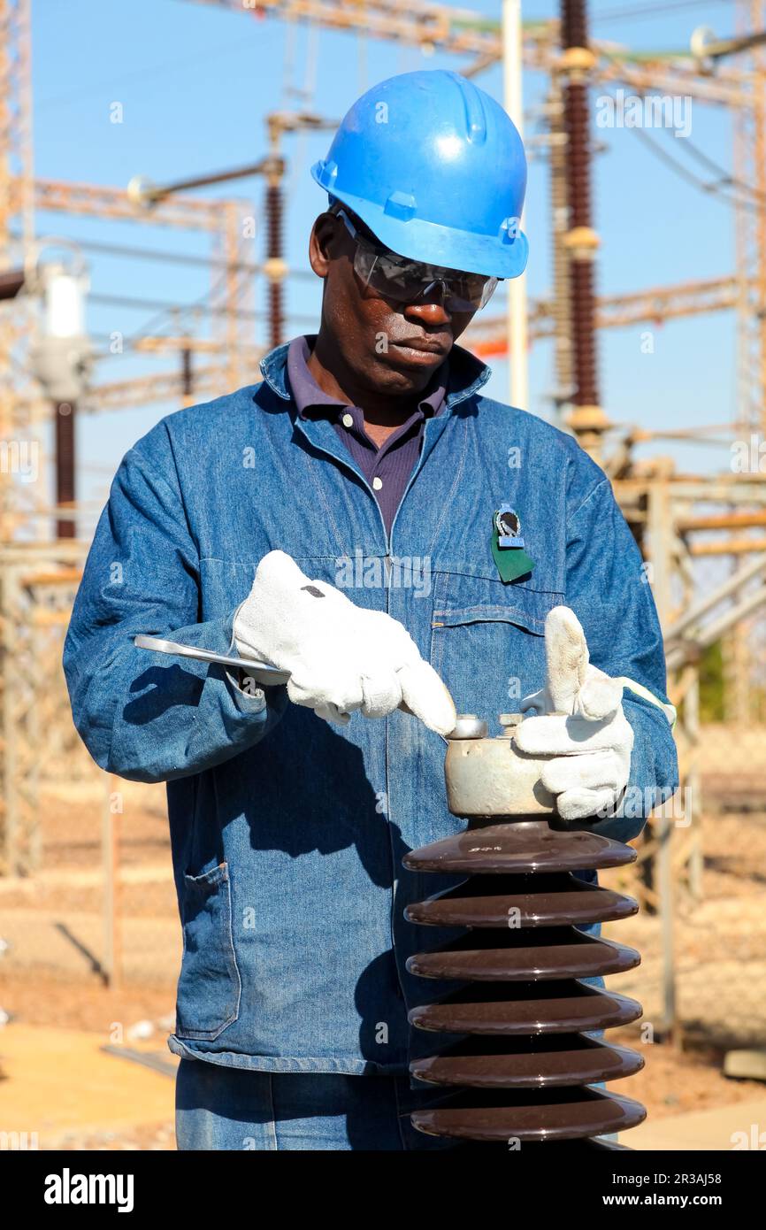 Man working on high voltage power lines hi-res stock photography and ...