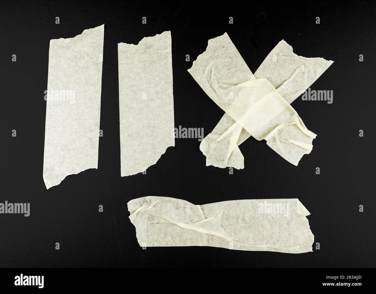 Set of various adhesive tape pieces on black background Stock Photo - Alamy