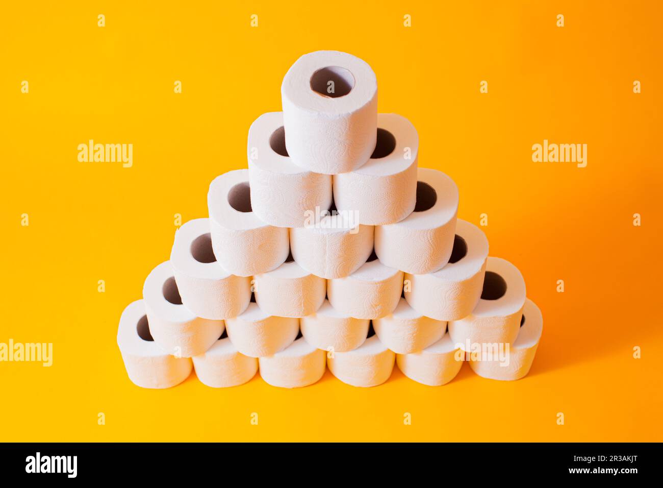 Pyramid created from white toilet paper rolls Stock Photo - Alamy