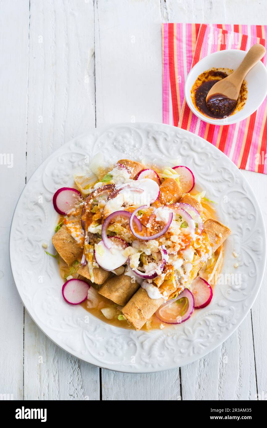 Taquitos hi-res stock photography and images - Alamy
