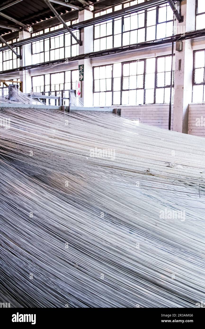 Cotton Thread lines for a copwinder weft assembly line loom Stock Photo ...