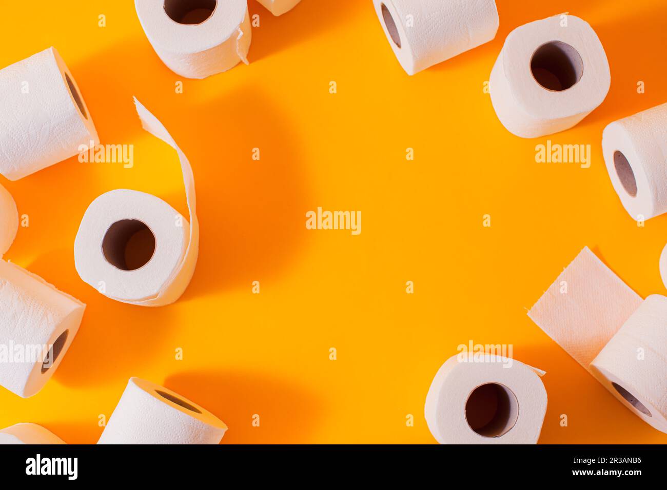 Top view of toilet paper rolls frame on the yellow Stock Photo - Alamy