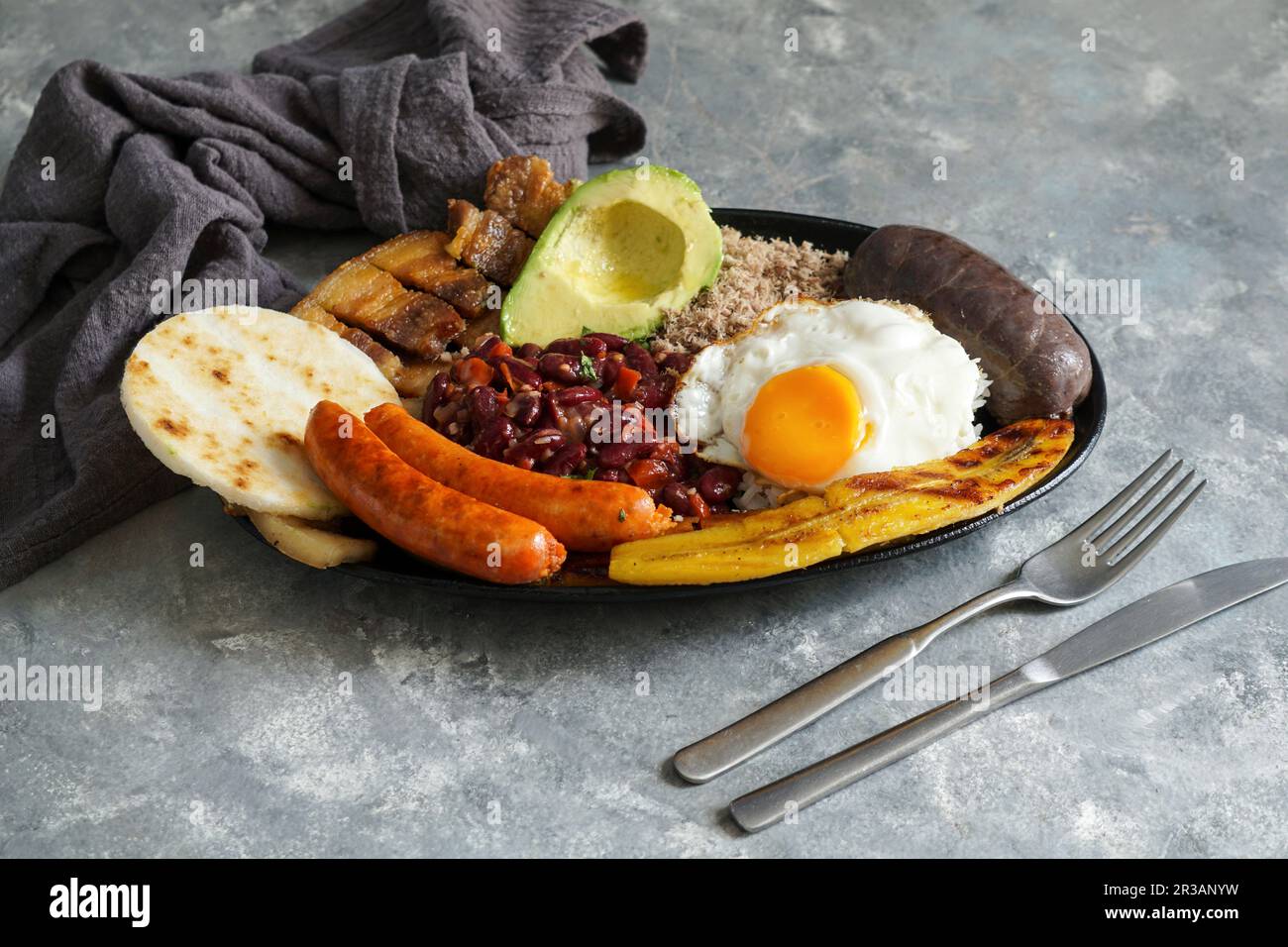 Bandeja paisa - Columbian fried pork belly, black pudding, sausage ...