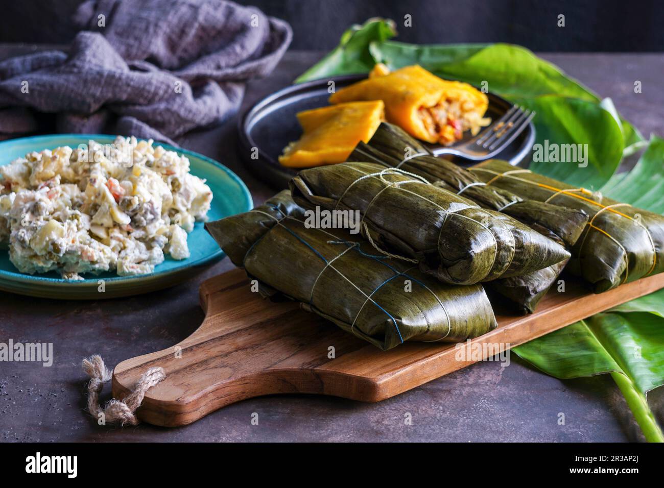 Hallaca - Venezuelan corn dough stuffed with a stew of pork and chicken ...