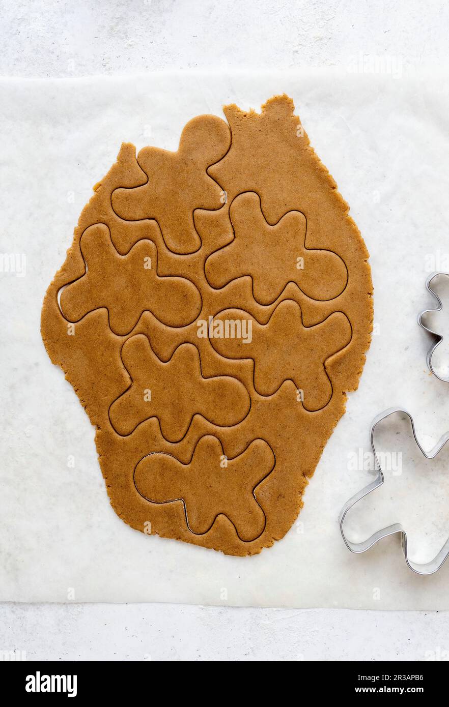 Cutting gingerbread men hi-res stock photography and images - Alamy