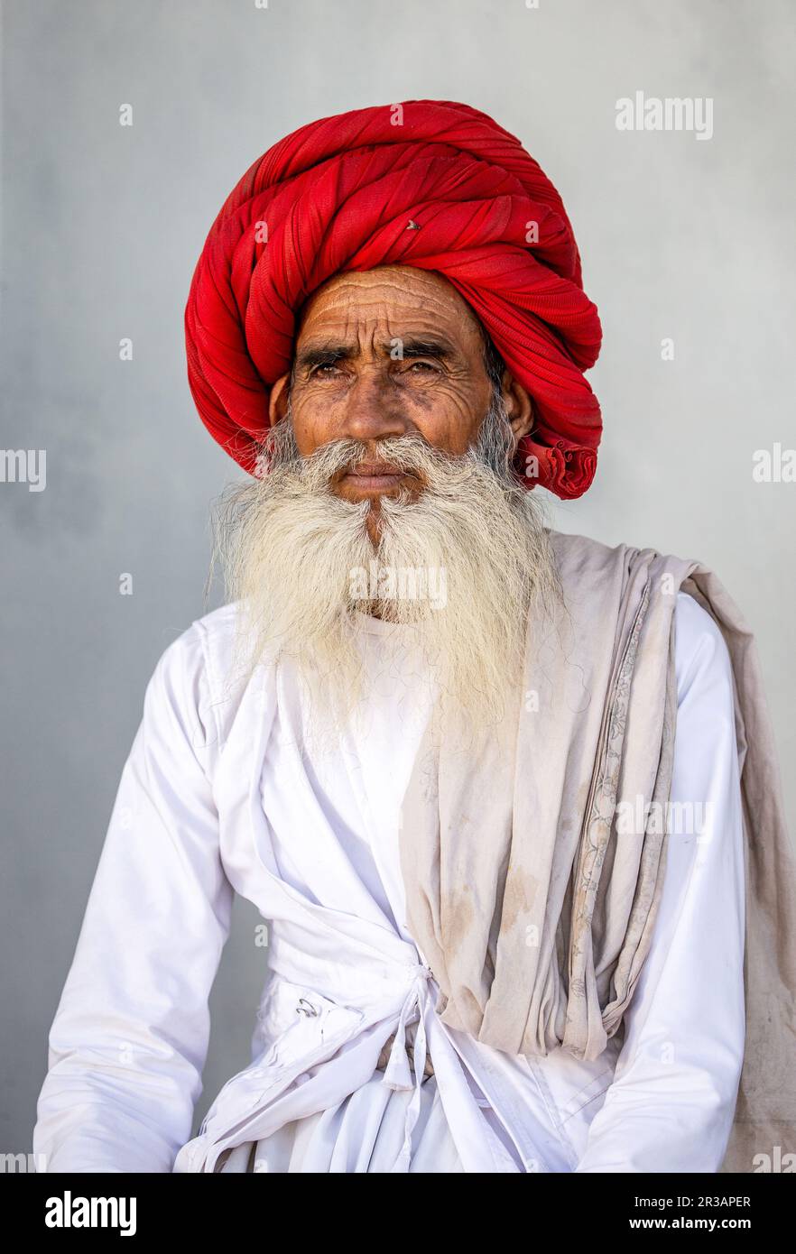 Portrait of a man of the Rabari ethnic group in a national headdress ...