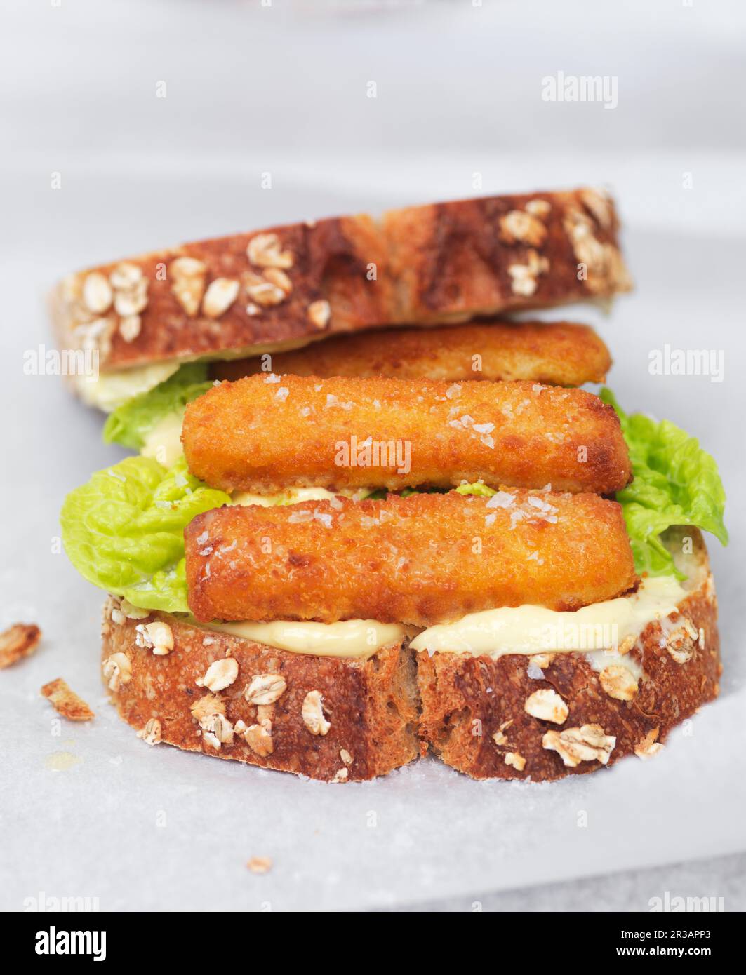 Open fish finger sandwich Stock Photo - Alamy