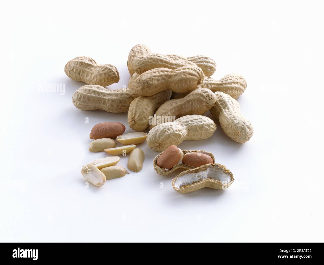 Peanuts with and without shells on a white background Stock Photo - Alamy