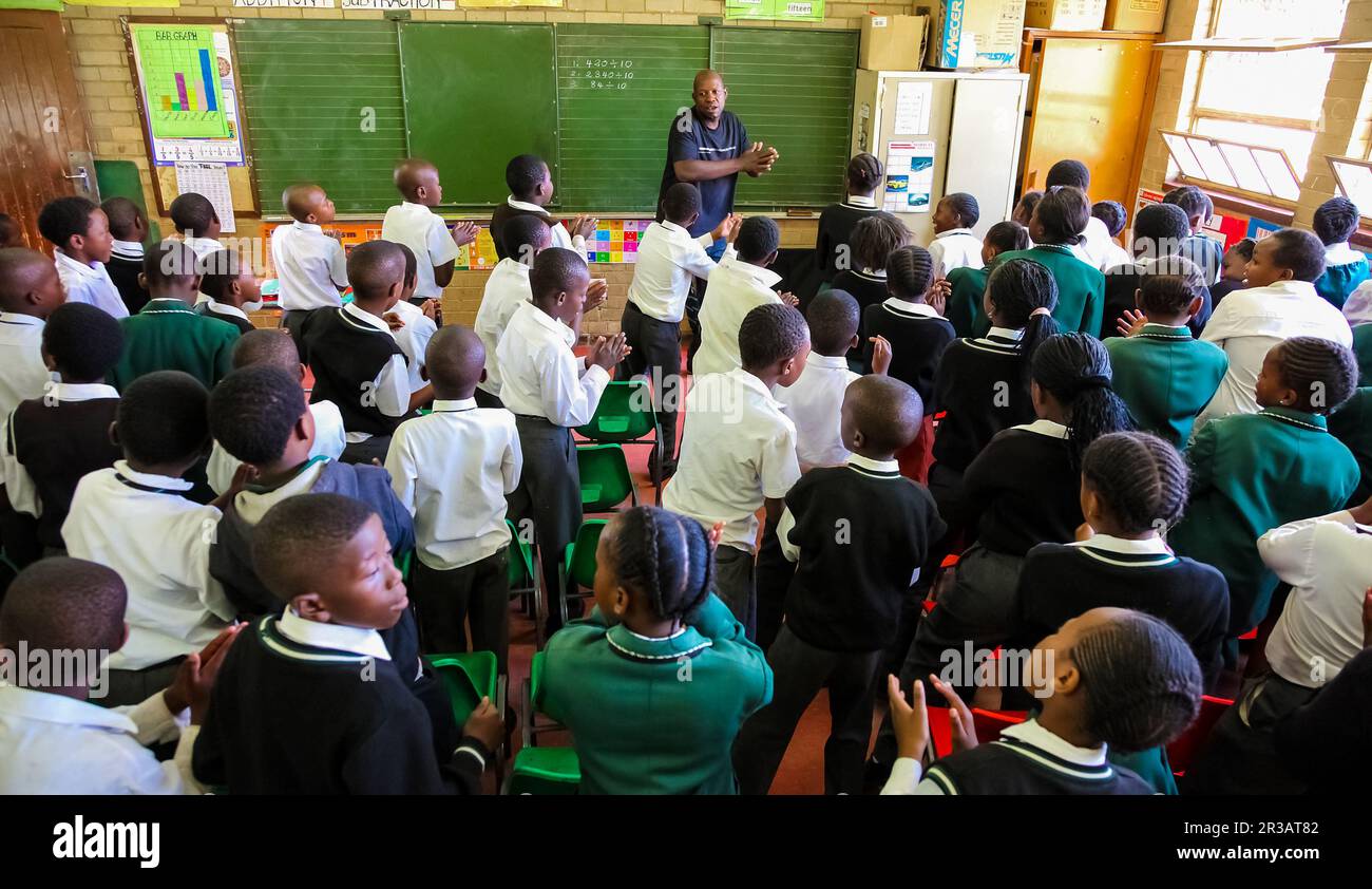 African Children and Teachers in Classroom Stock Photo - Alamy