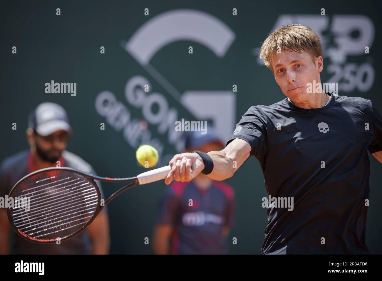 Ilya Ivashka of Belarus returns a ball to Guido Pella of Argentina ...
