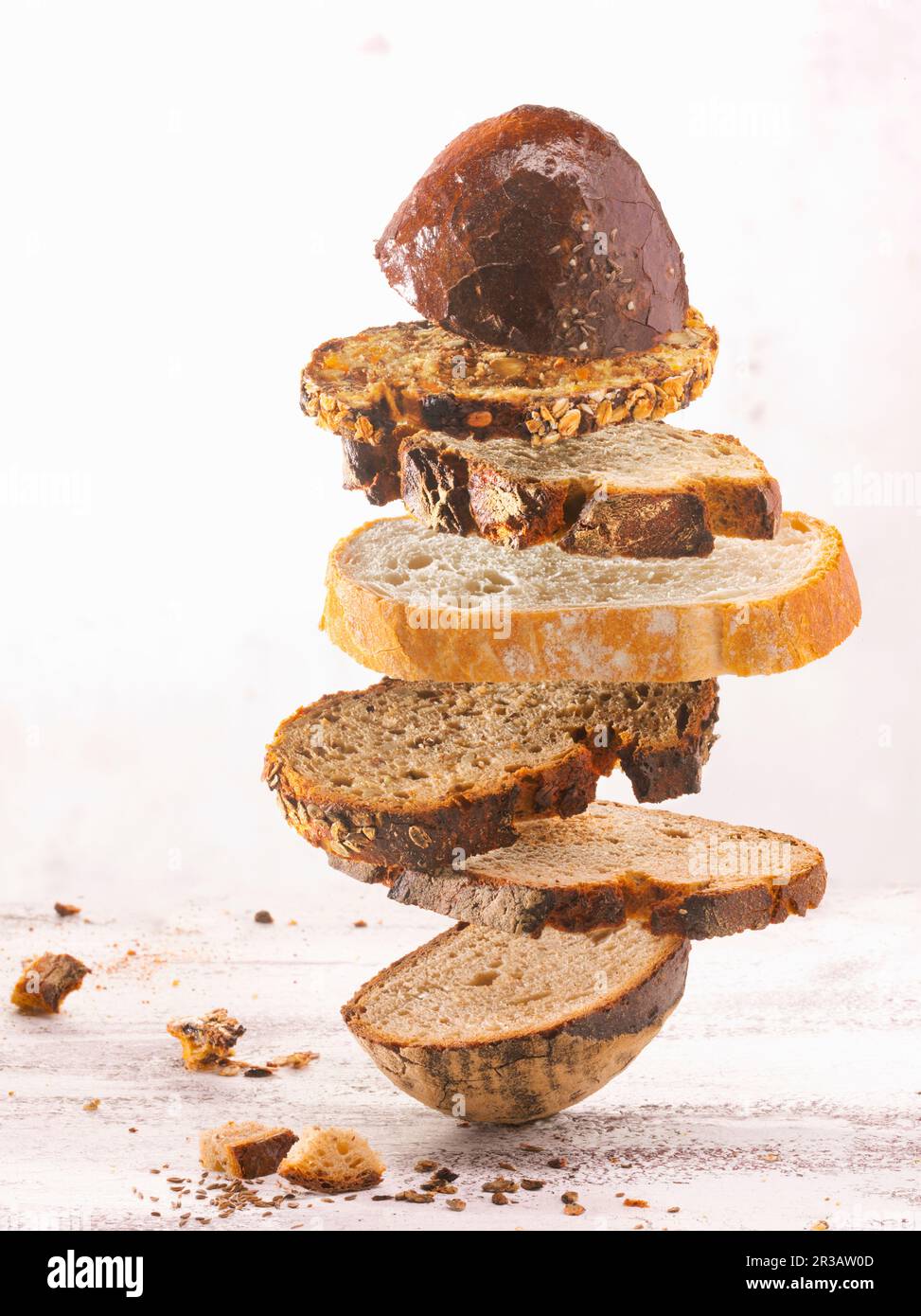 Seven slices of bread flying through the air Stock Photo - Alamy