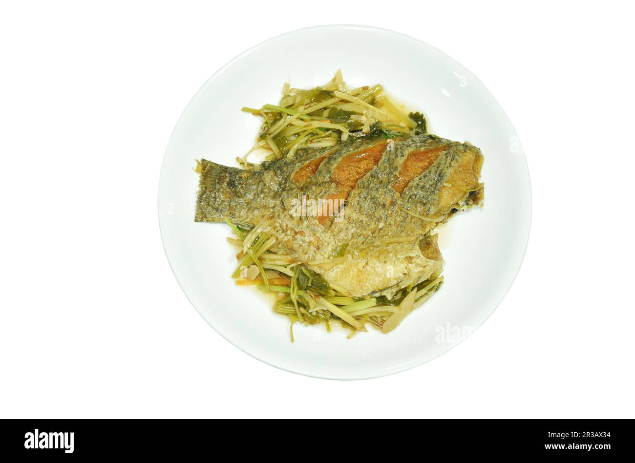 deep fried Nile Tilapia or mango fish slice dressing soy sauce and ...