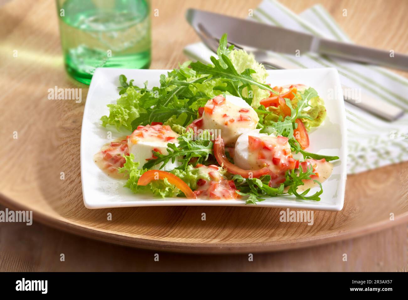 Rocket lettuce and goat's cheese salad Stock Photo - Alamy