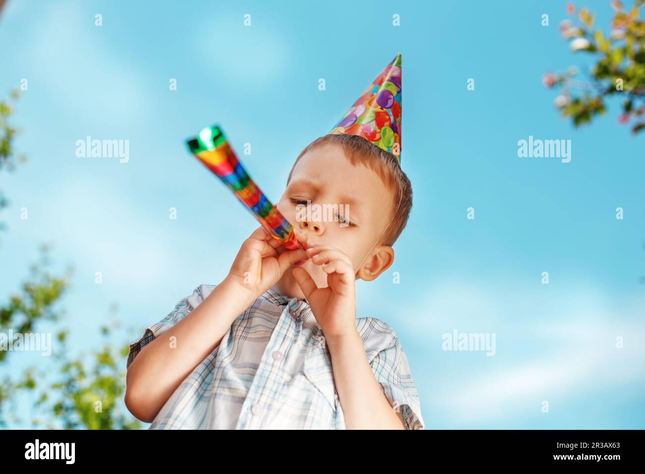 Little boy having fun and celebrating birthday Stock Photo - Alamy