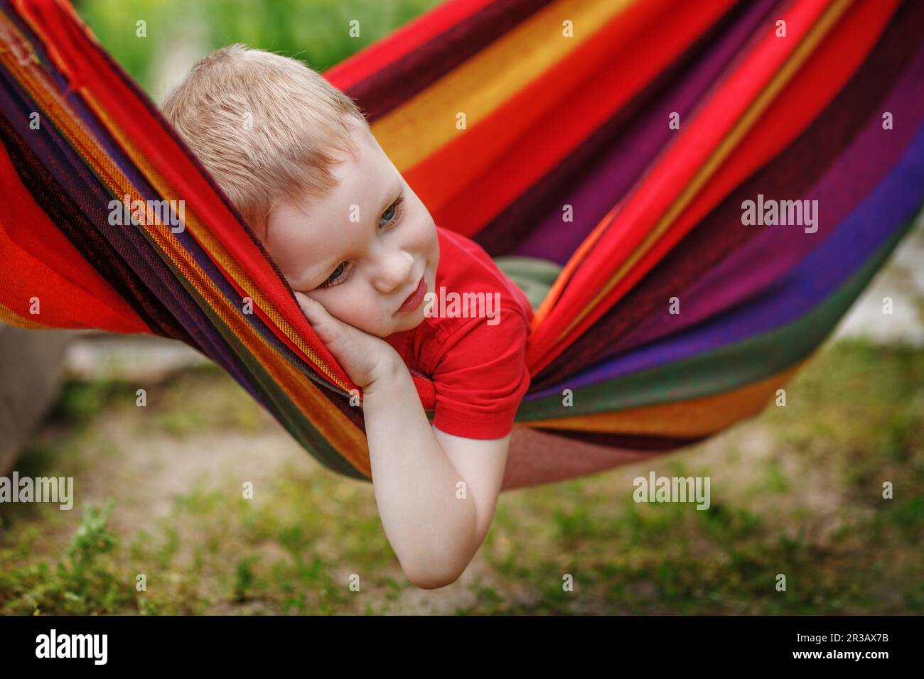 Baby in a hammock hi-res stock photography and images - Alamy