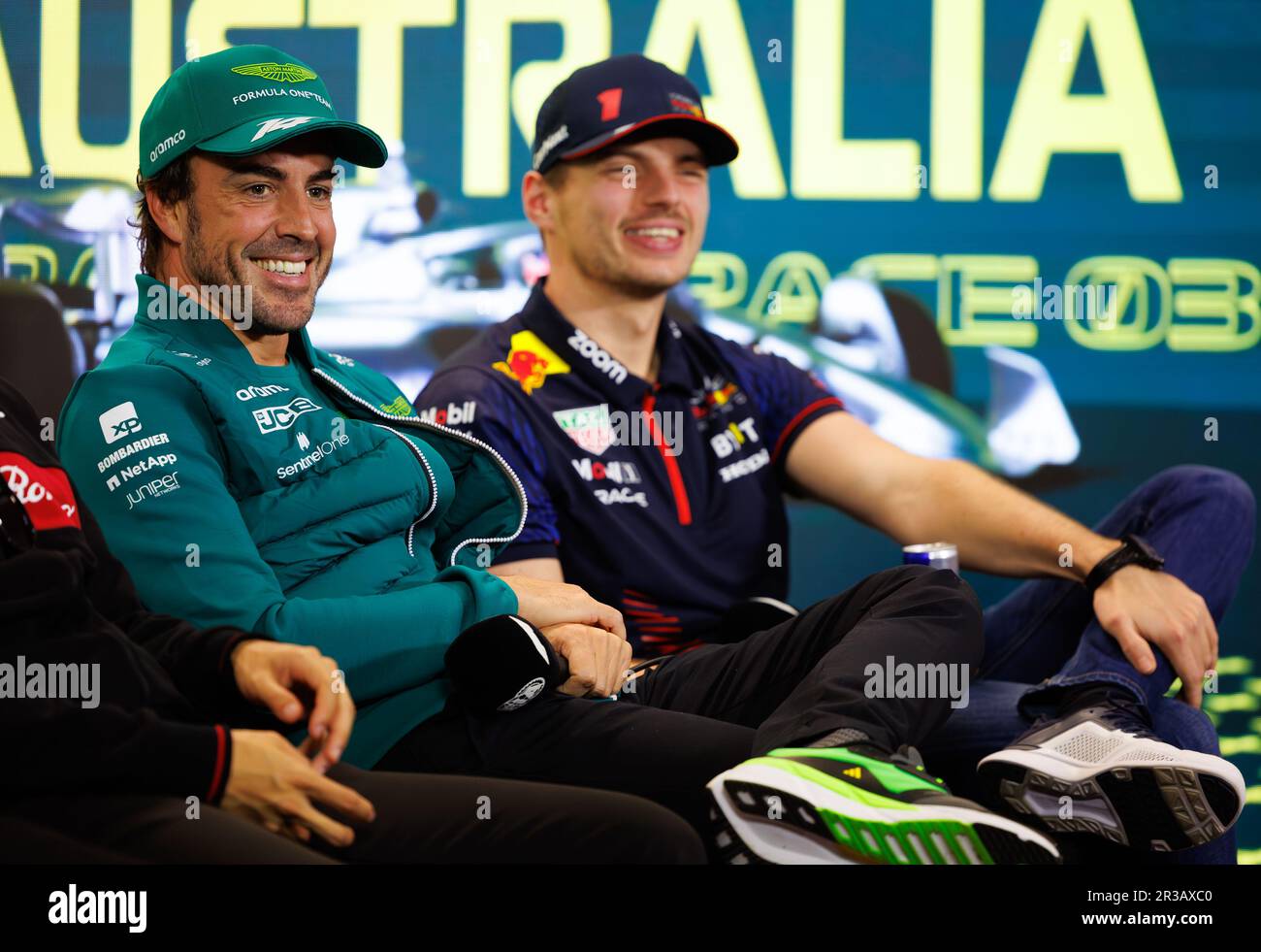 Fernando Alonso (ESP) of team Aston Martin and Max Verstappen (NED) of ...