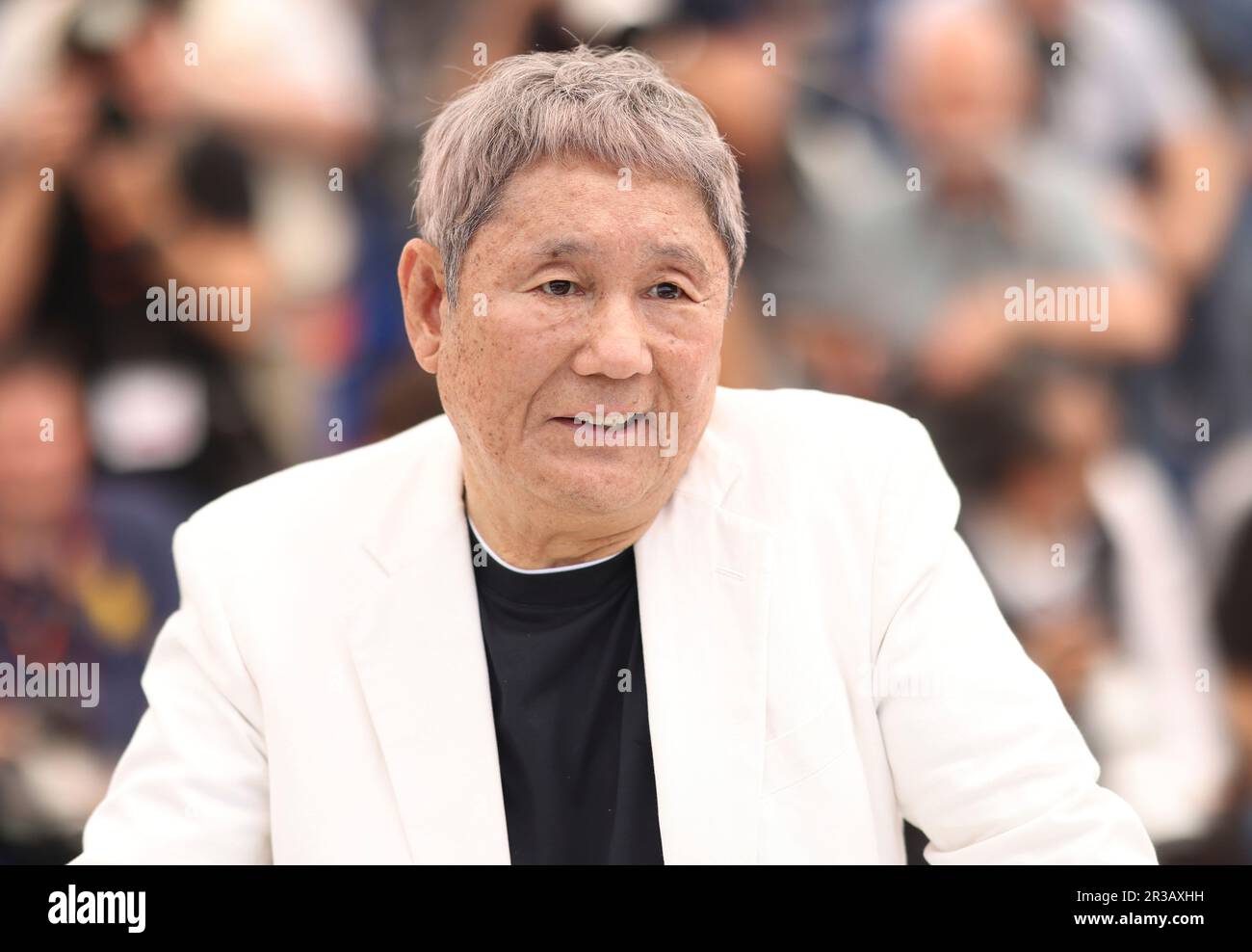 Director Takeshi Kitano poses for photographers at the photo call for ...
