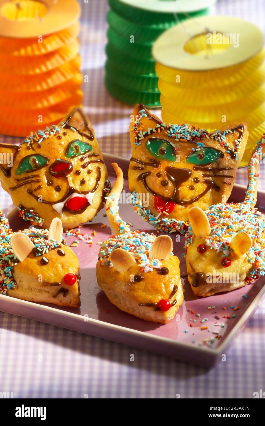 Cat-and-mouse pastries for a children's party Stock Photo - Alamy