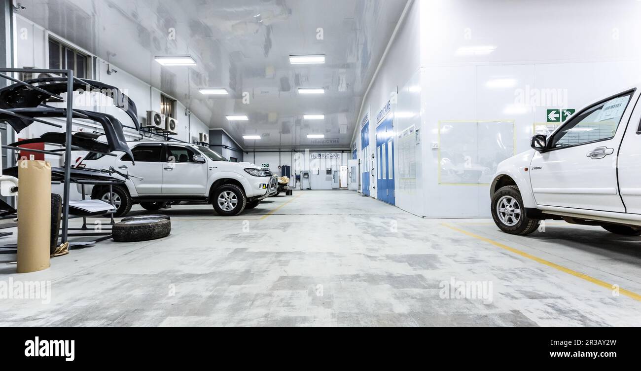 Inside an empty panel beater vehicle workshop for fixing damaged cars ...