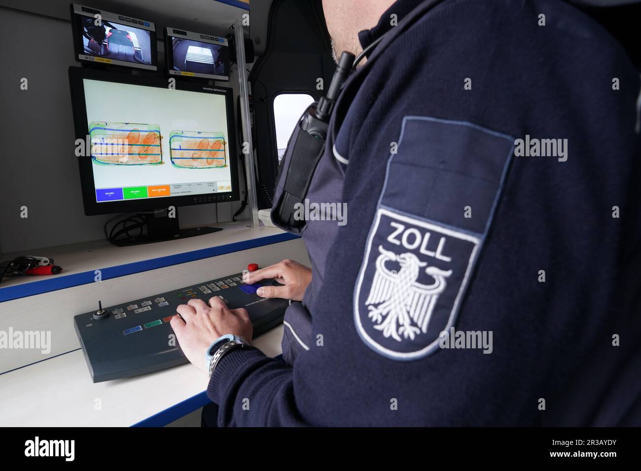 Hamburg, Germany. 23rd May, 2023. Customs officers check a suitcase in ...