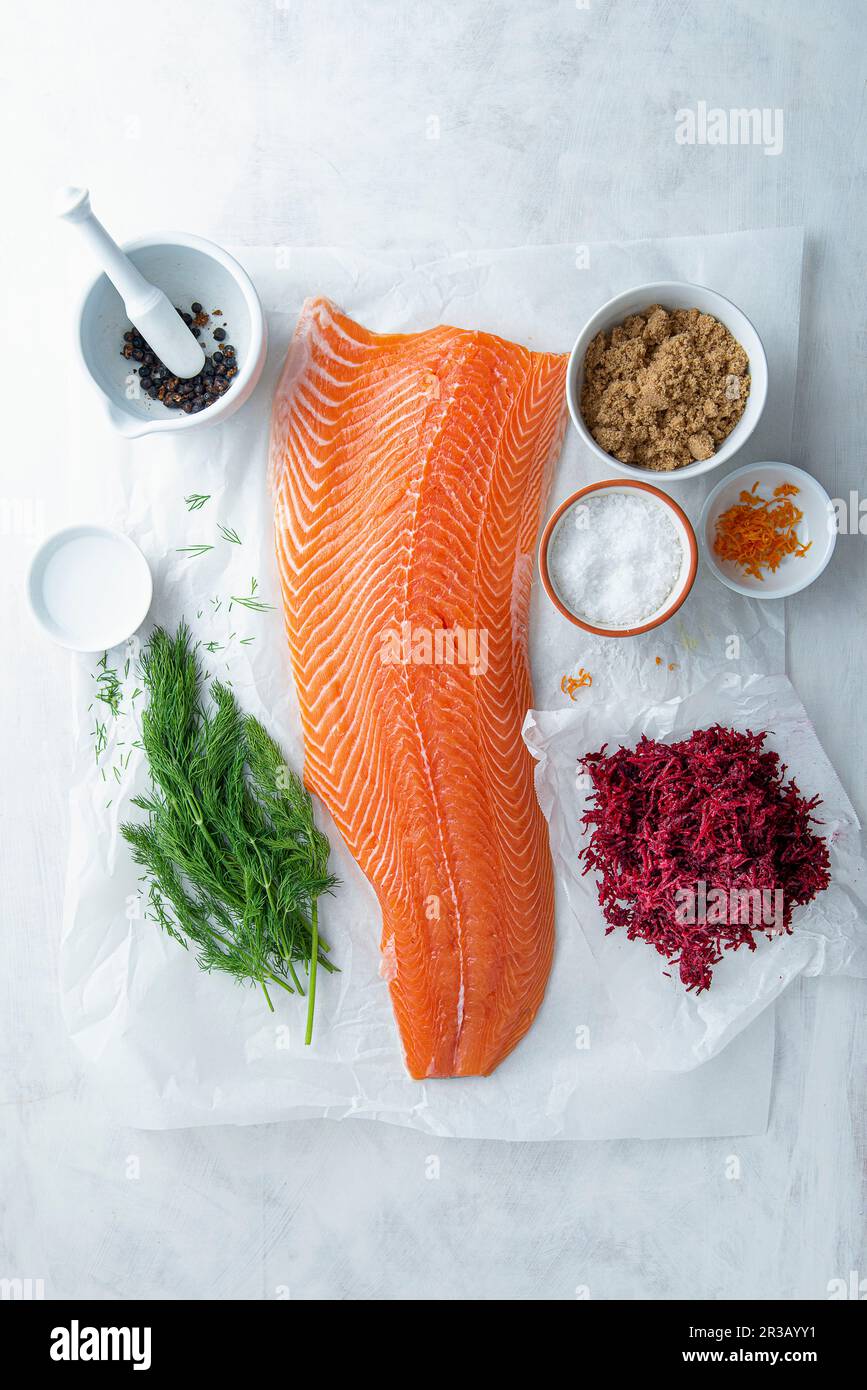 Fillet of salmon and ingredients for beetroot, juniper and gin cured ...
