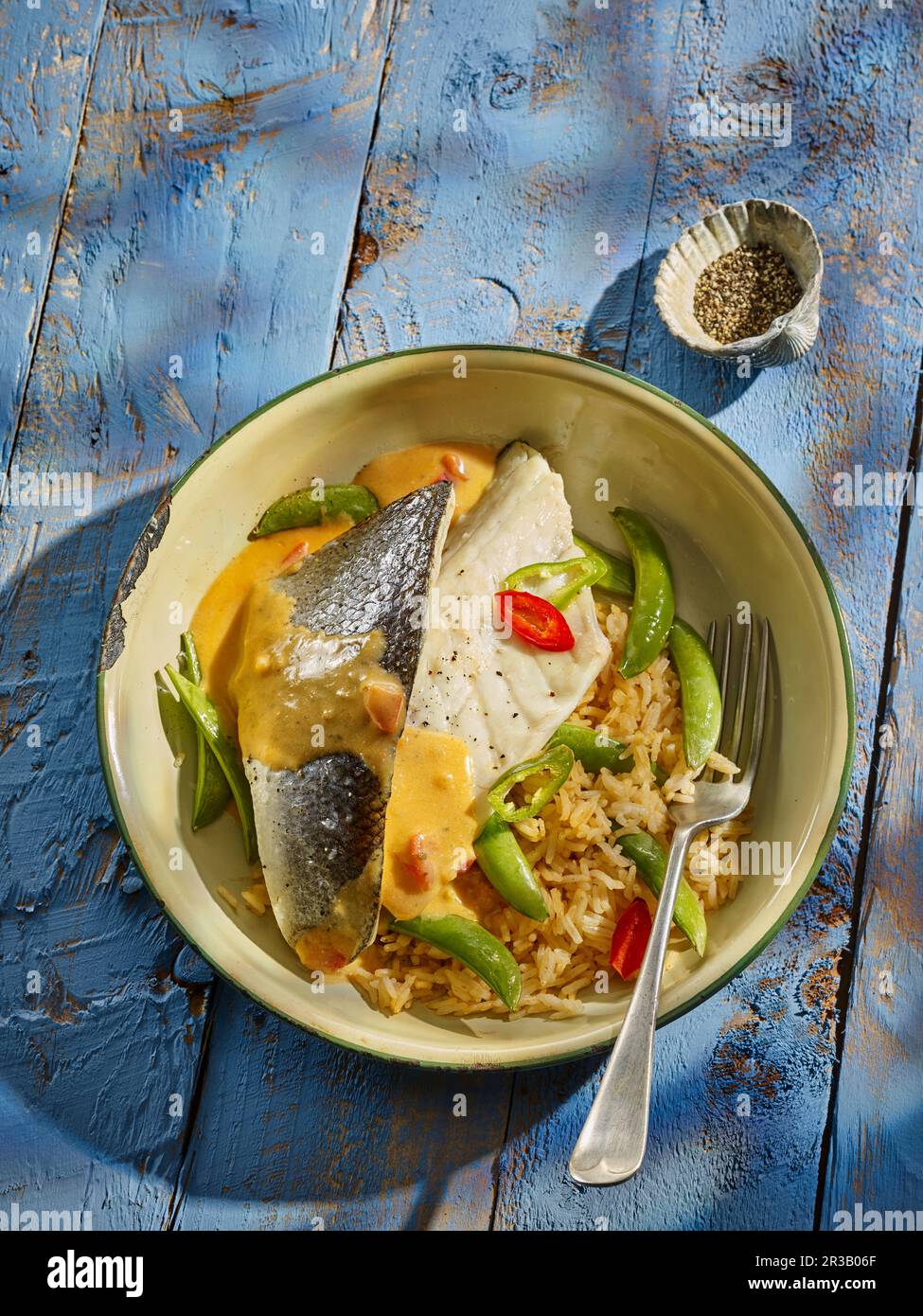 Thai Style Sea Bass with Basmati rice, red Thai curry sauce Stock Photo ...