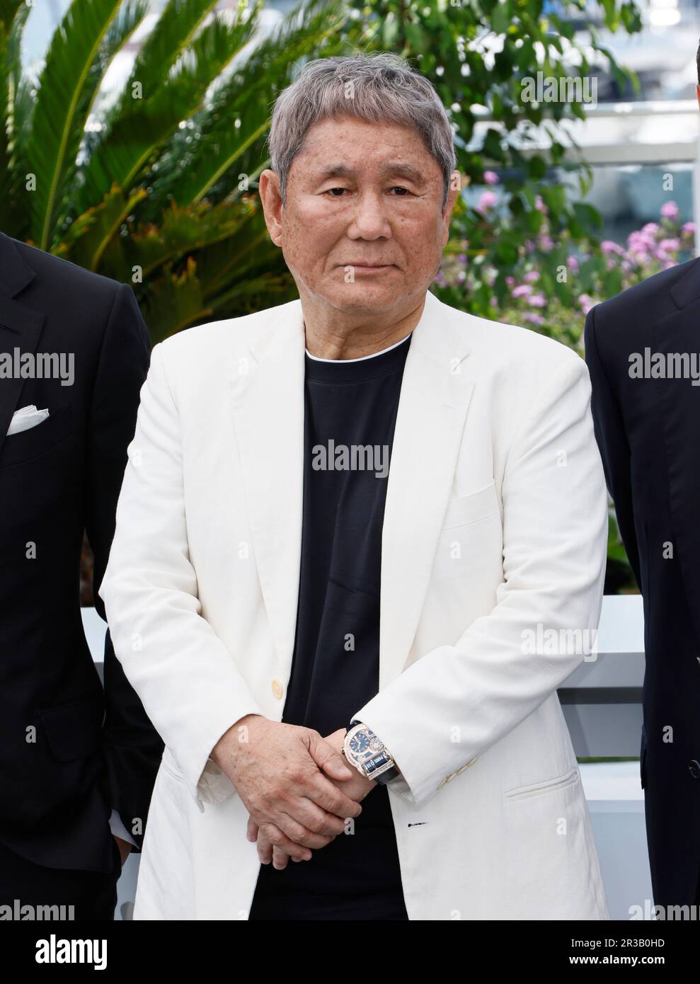 Director Takeshi Kitano poses for photographers at the photo call for ...