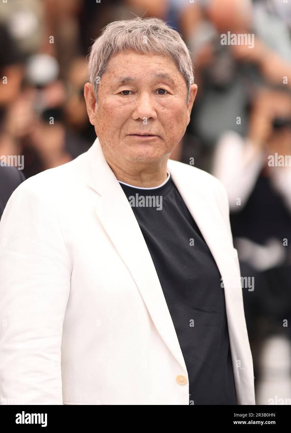 Director Takeshi Kitano poses for photographers at the photo call for ...