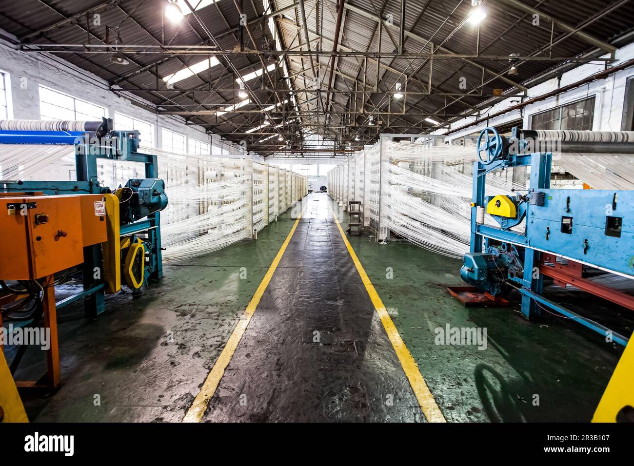Cotton Thread lines for a copwinder weft assembly line loom Stock Photo ...