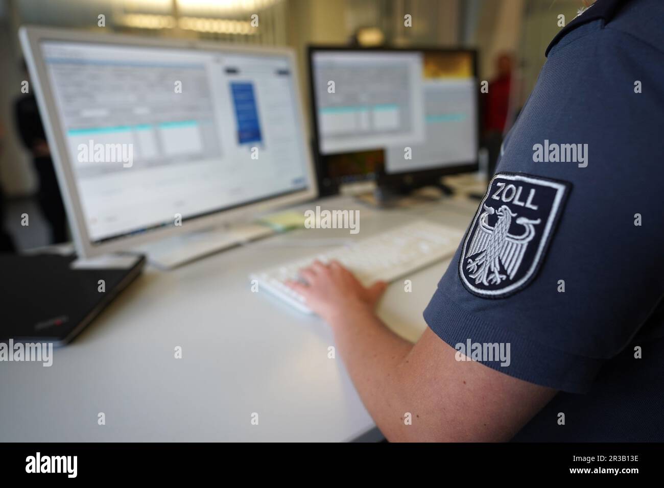 Hamburg, Germany. 23rd May, 2023. Customs officers work in an office in ...