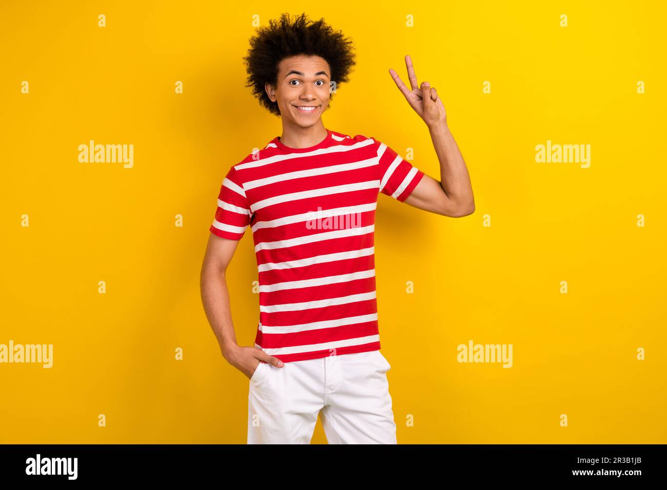 Photo of cheerful person hand fingers demonstrate v-sign hello ...