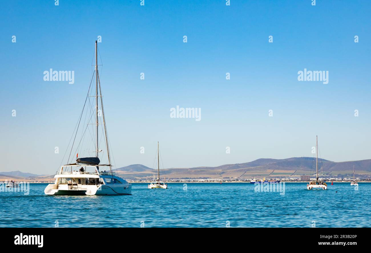 Tourists riding on catamaran yacht outside harbor port of Cape Town Stock Photo - Alamy
