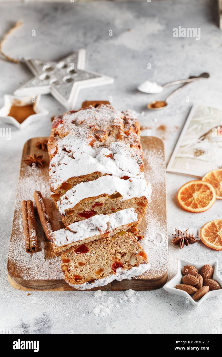 Stollen is fruit bread of nuts, spices, dried or candied fruit, coated ...