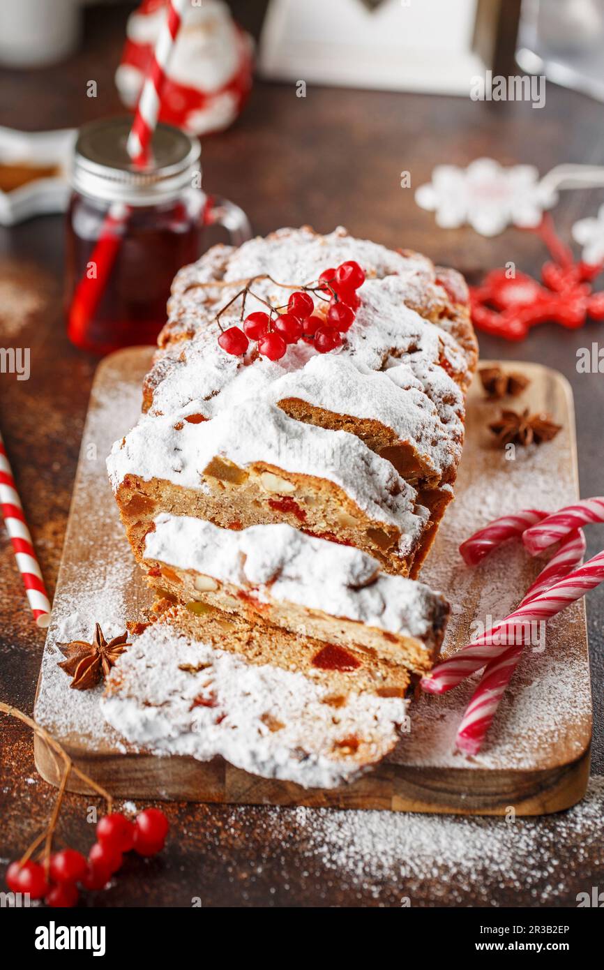 Stollen is fruit bread of nuts, spices, dried or candied fruit, coated ...