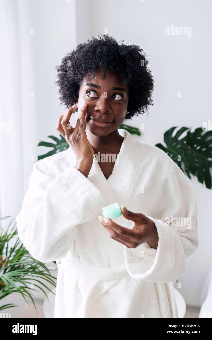 Beauty and woman and face and cream hi-res stock photography and images ...
