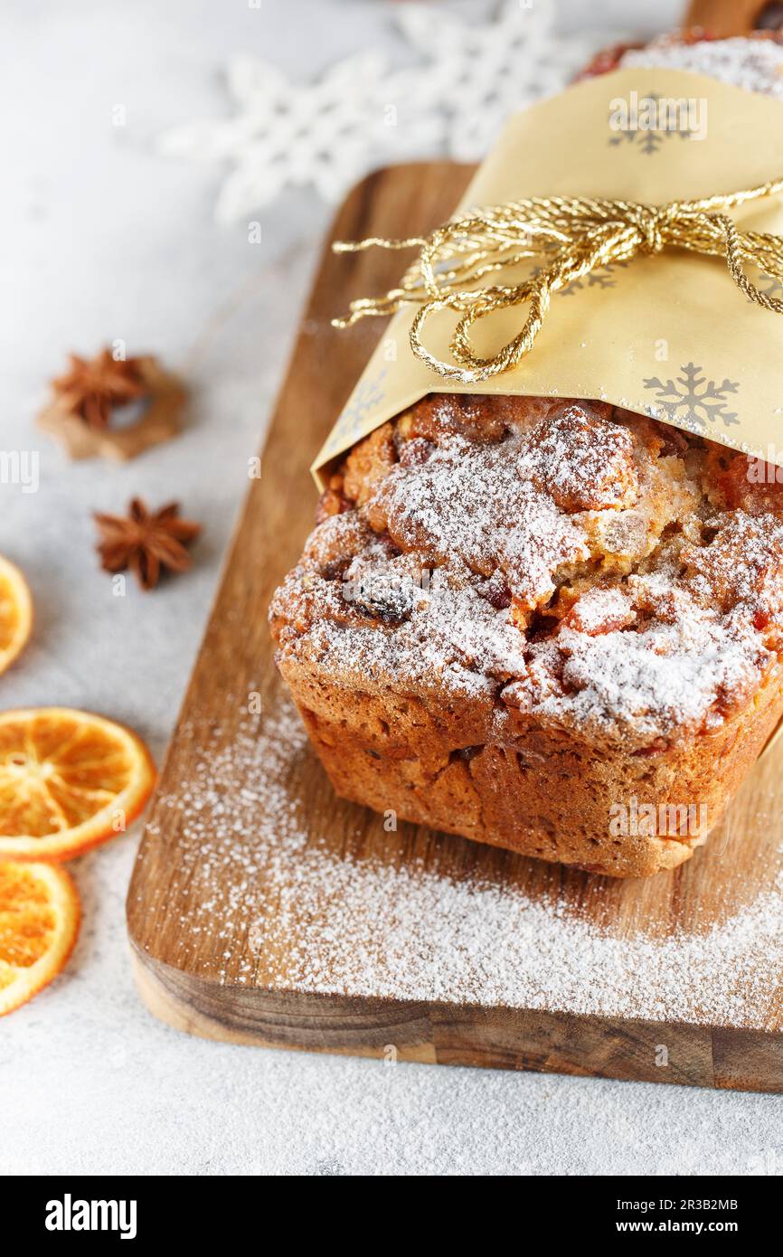 Stollen is fruit bread of nuts, spices, dried or candied fruit, coated ...
