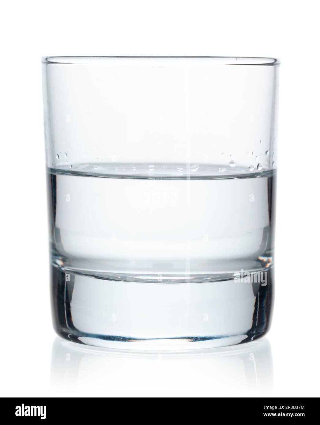 Glass of vodka isolated on white background Stock Photo - Alamy