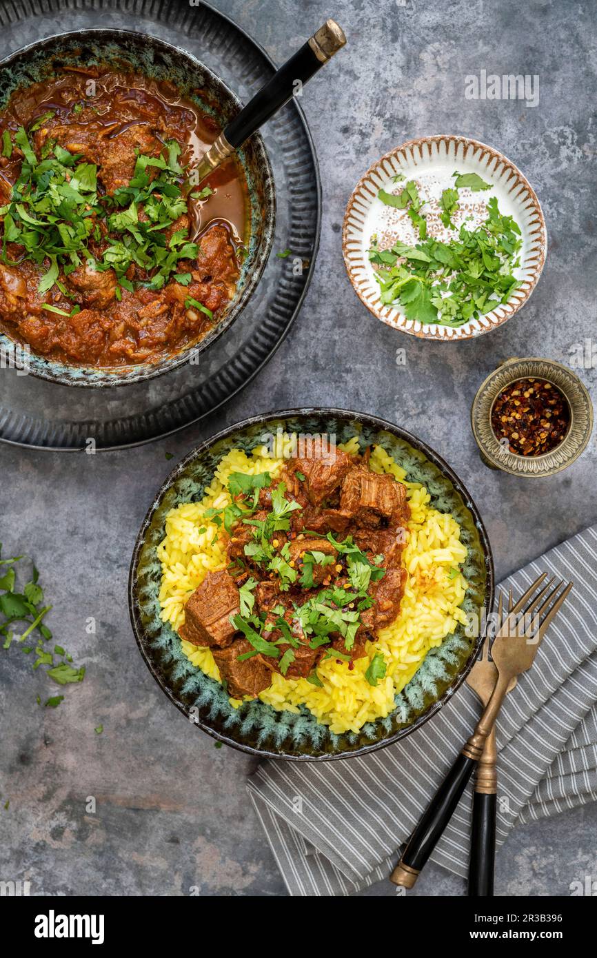 Beef curry with saffron rice Stock Photo - Alamy