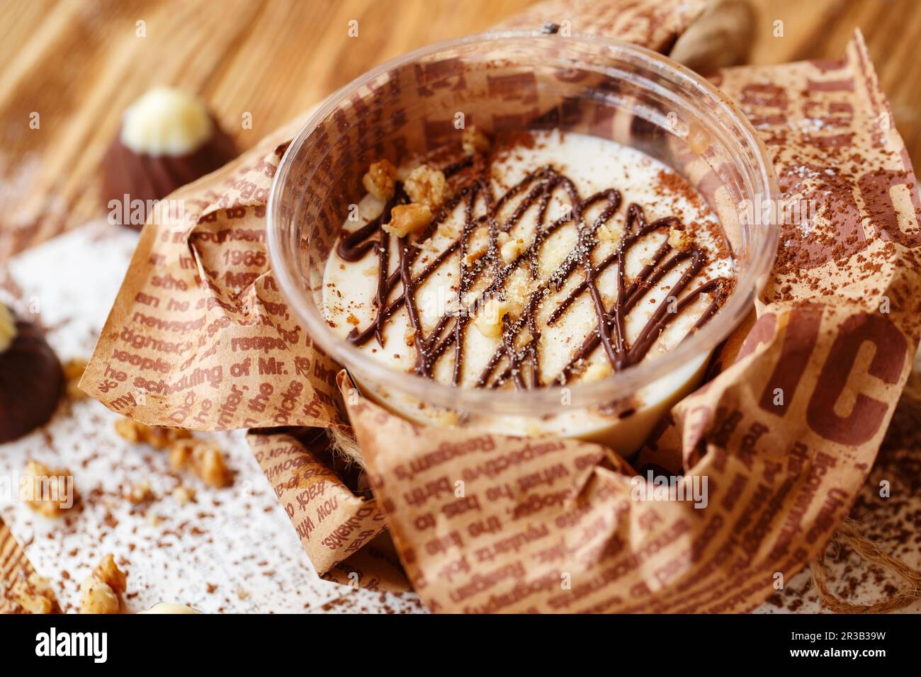 Italian dessert Panakota with on a wooden background. Creamy milk ...
