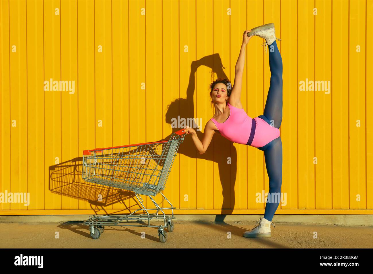 Women doing vertical wall splits hi-res stock photography and images ...